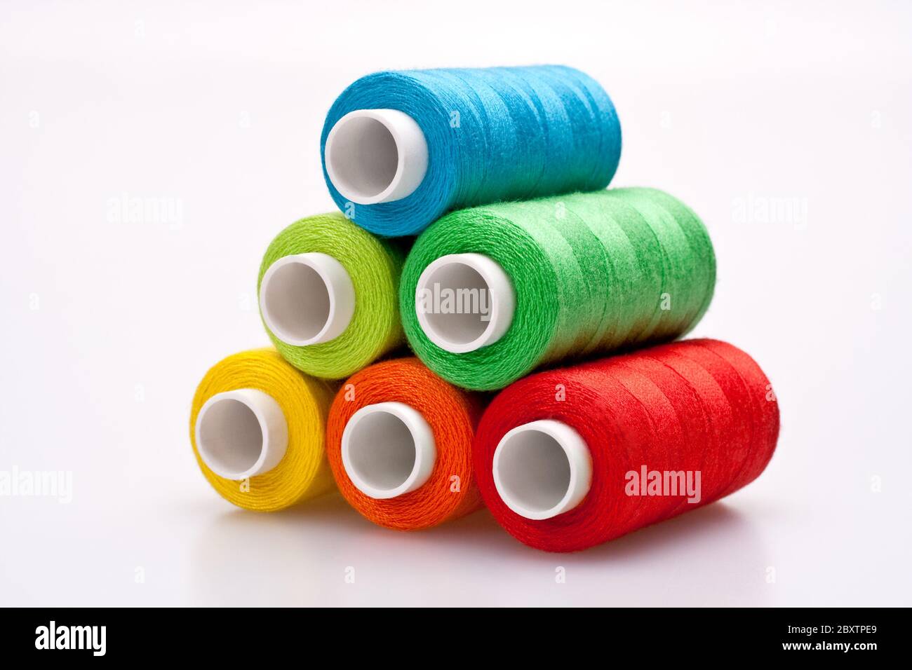 colored thread for sewing Stock Photo - Alamy