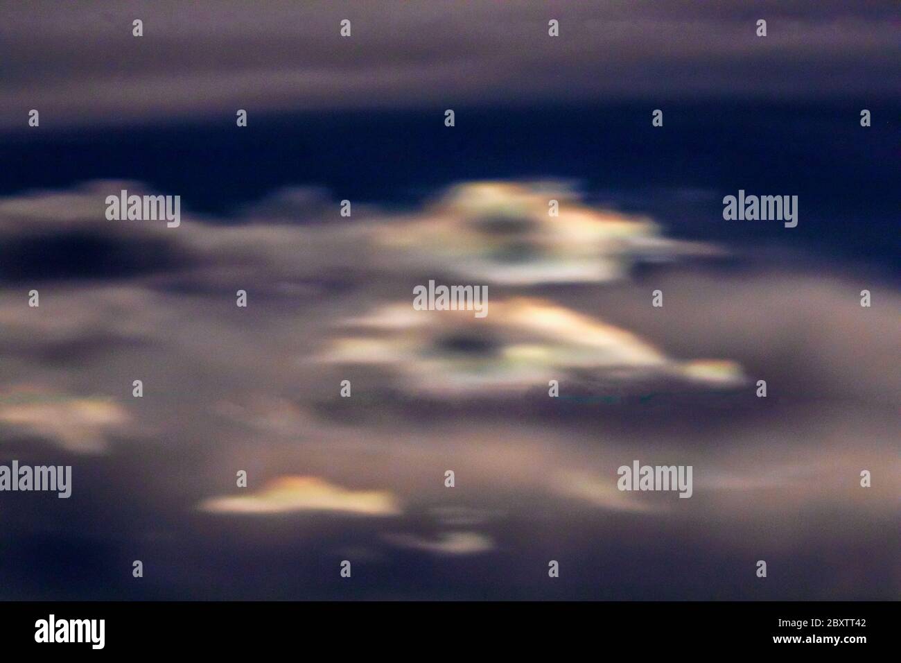 Long time exposure of backlit clouds from full Strawberry moon over ...