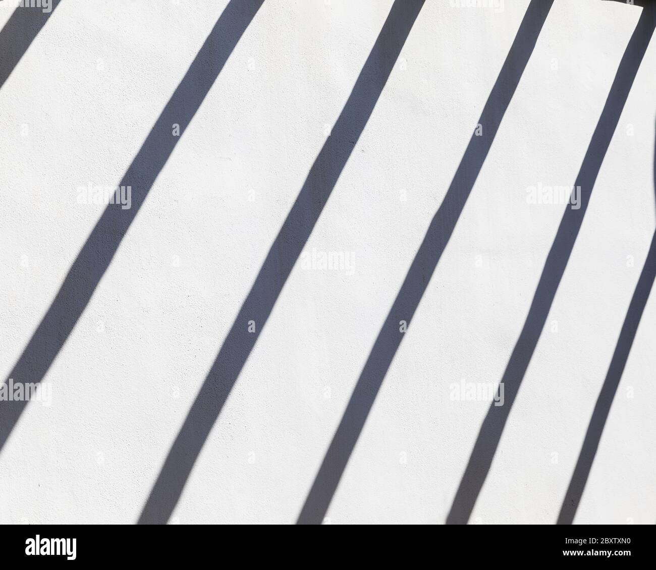 Shadow Lines. Abstract background od whitewashed wall with grey line ...
