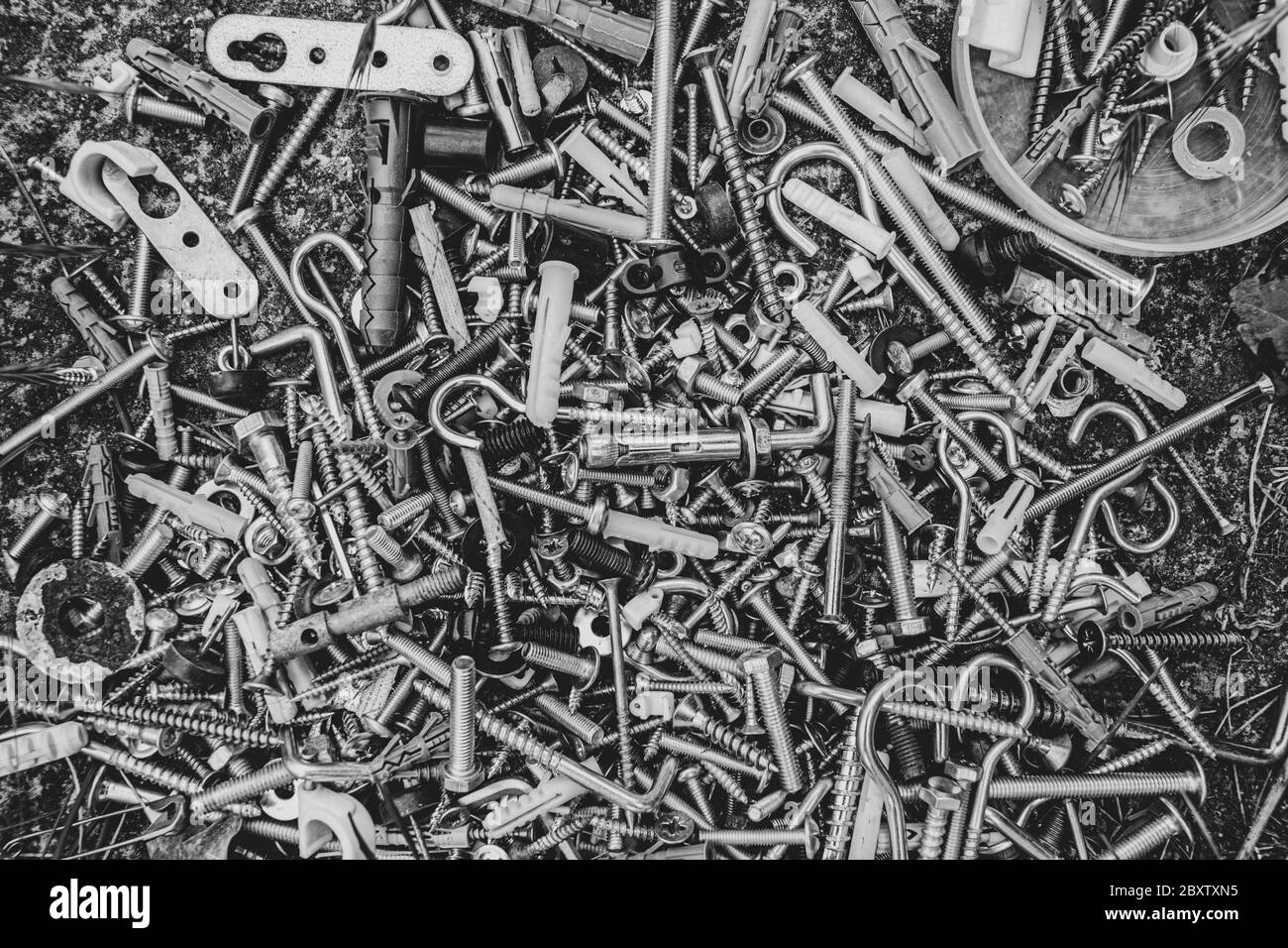 Black and white photo of assorted metalware bolts and nuts flat lay ...