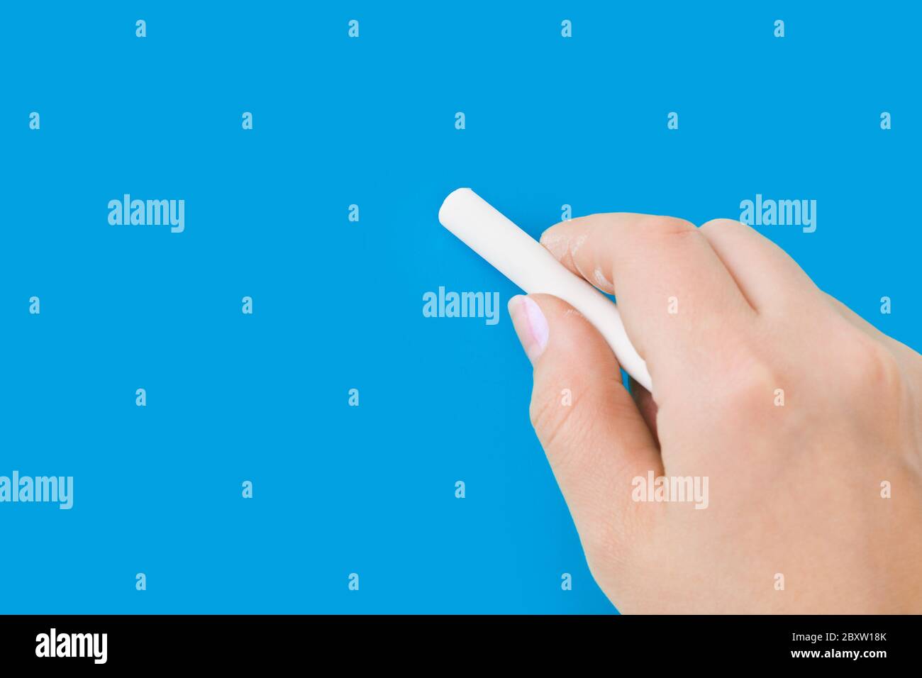 Hand with chalk writing on blackboard Stock Photo - Alamy