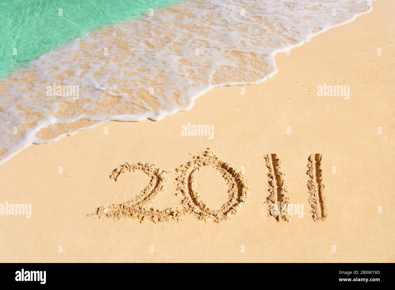 Numbers on beach 2011 Stock Photo - Alamy