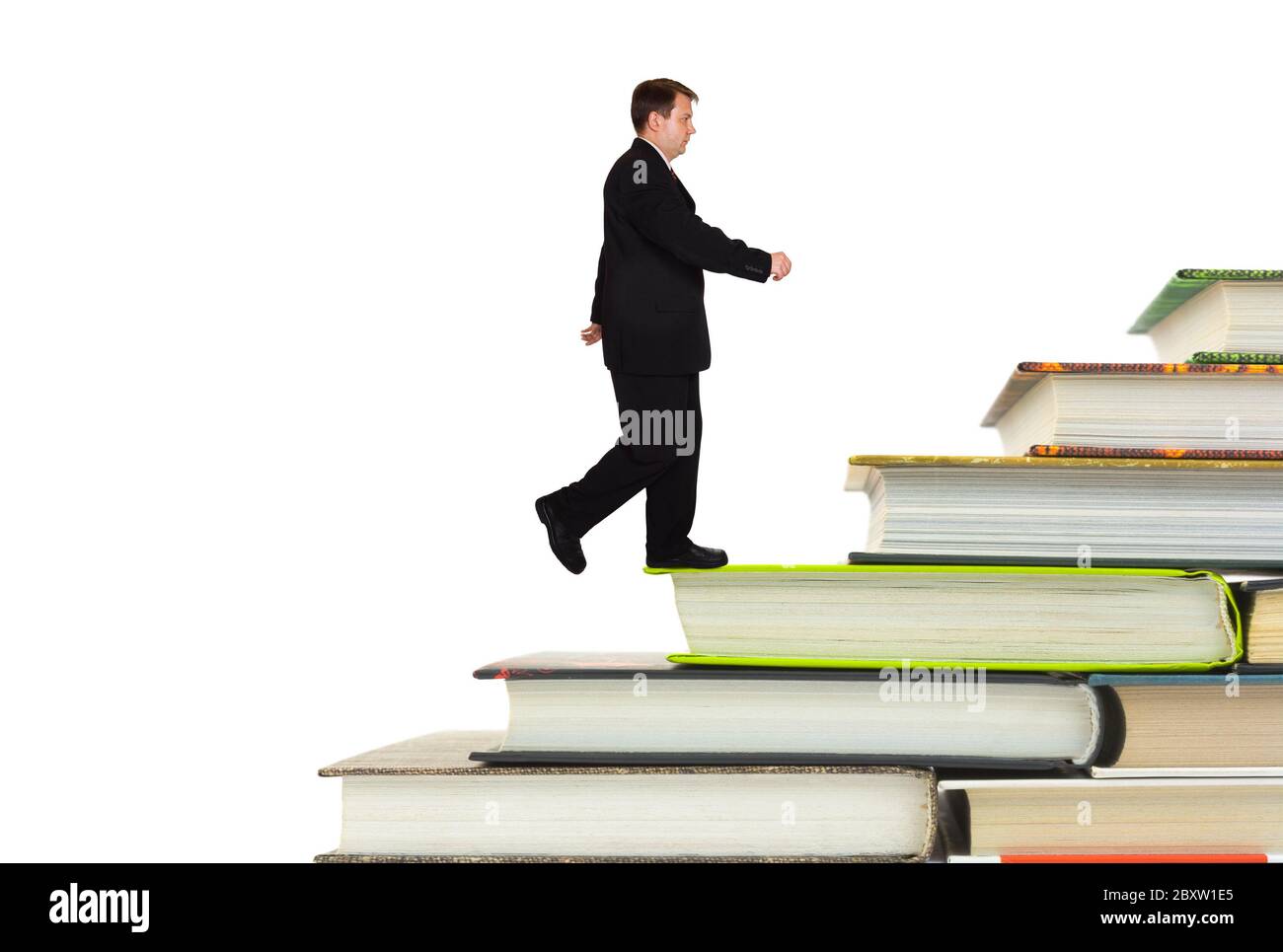 Man and book stairs Stock Photo - Alamy