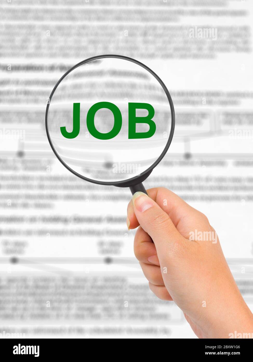 Magnifying glass in hand and word Job Stock Photo - Alamy