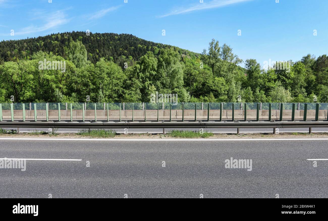 A multi-lane road passes through areas of high landscape value. Express ...