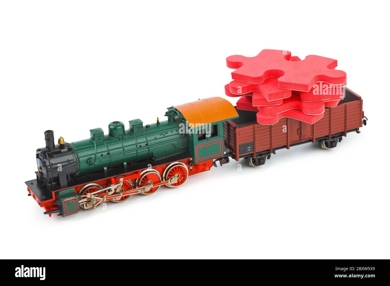 Toy train with puzzle Stock Photo - Alamy