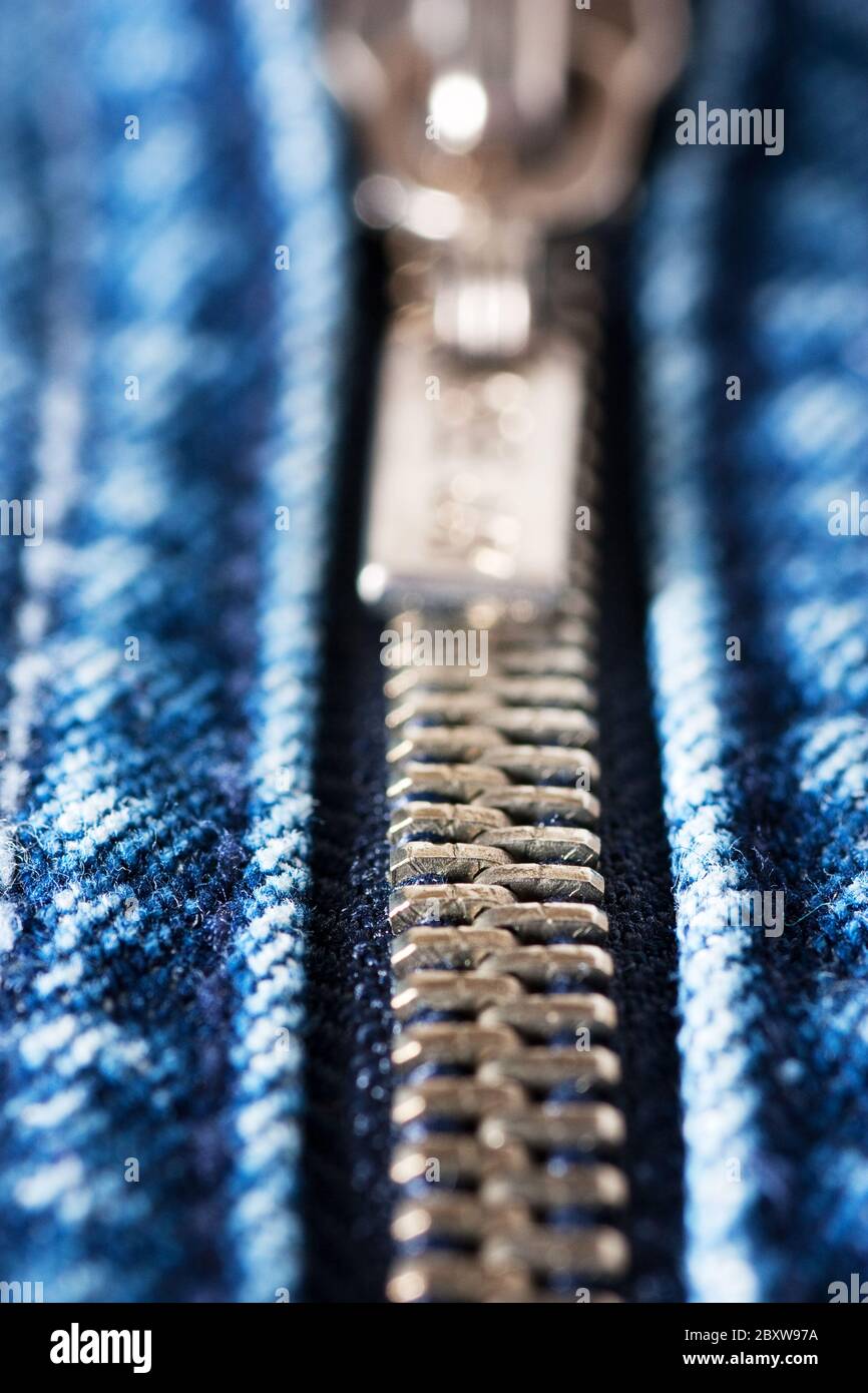 Undone zip hi-res stock photography and images - Alamy