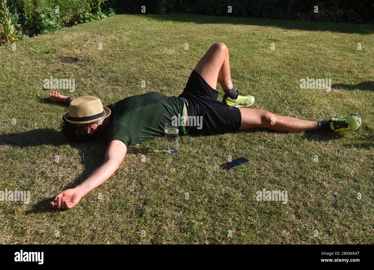 Man chilling out on hot day Stock Photo - Alamy