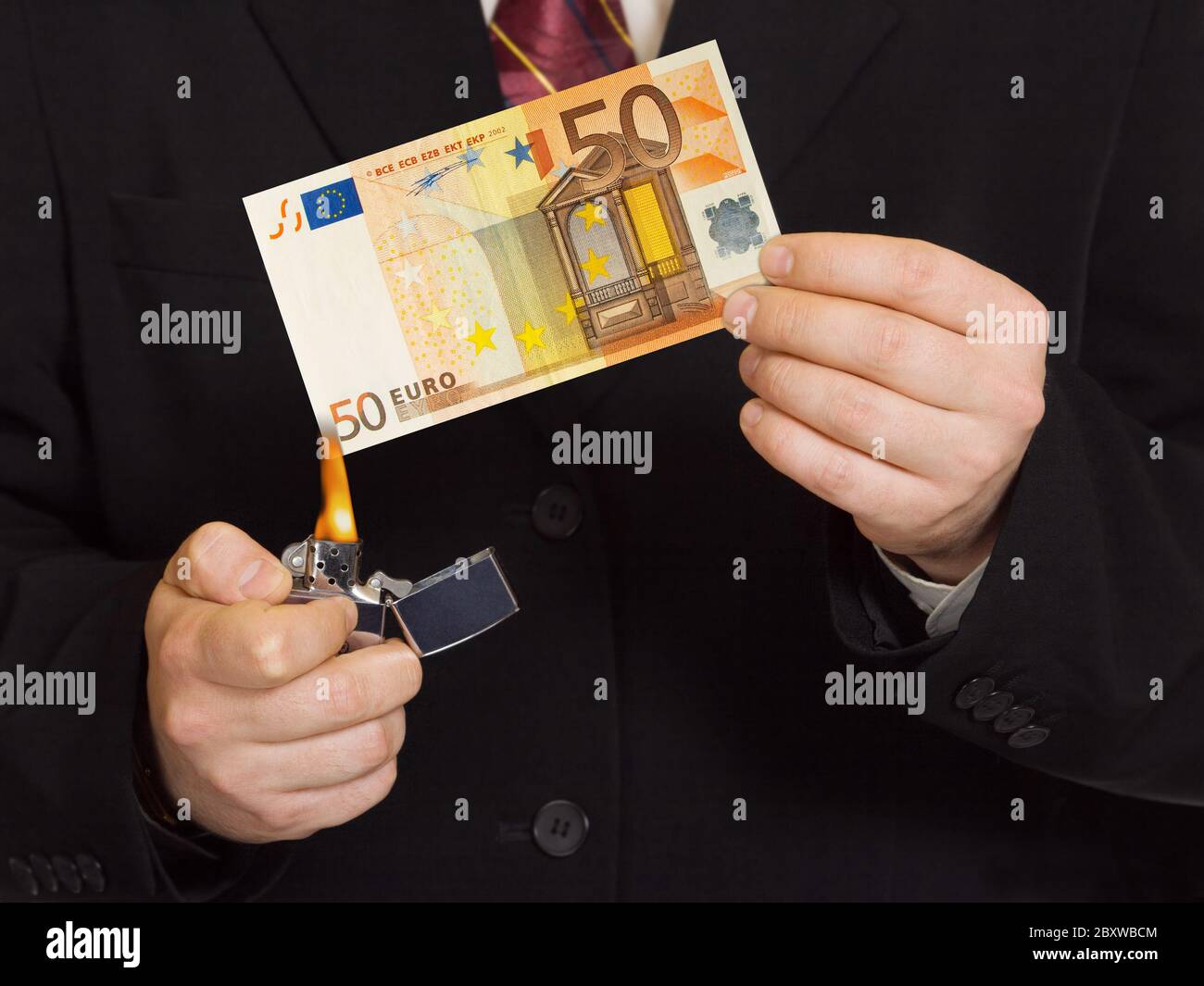 Burn money with lighter hi-res stock photography and images - Alamy