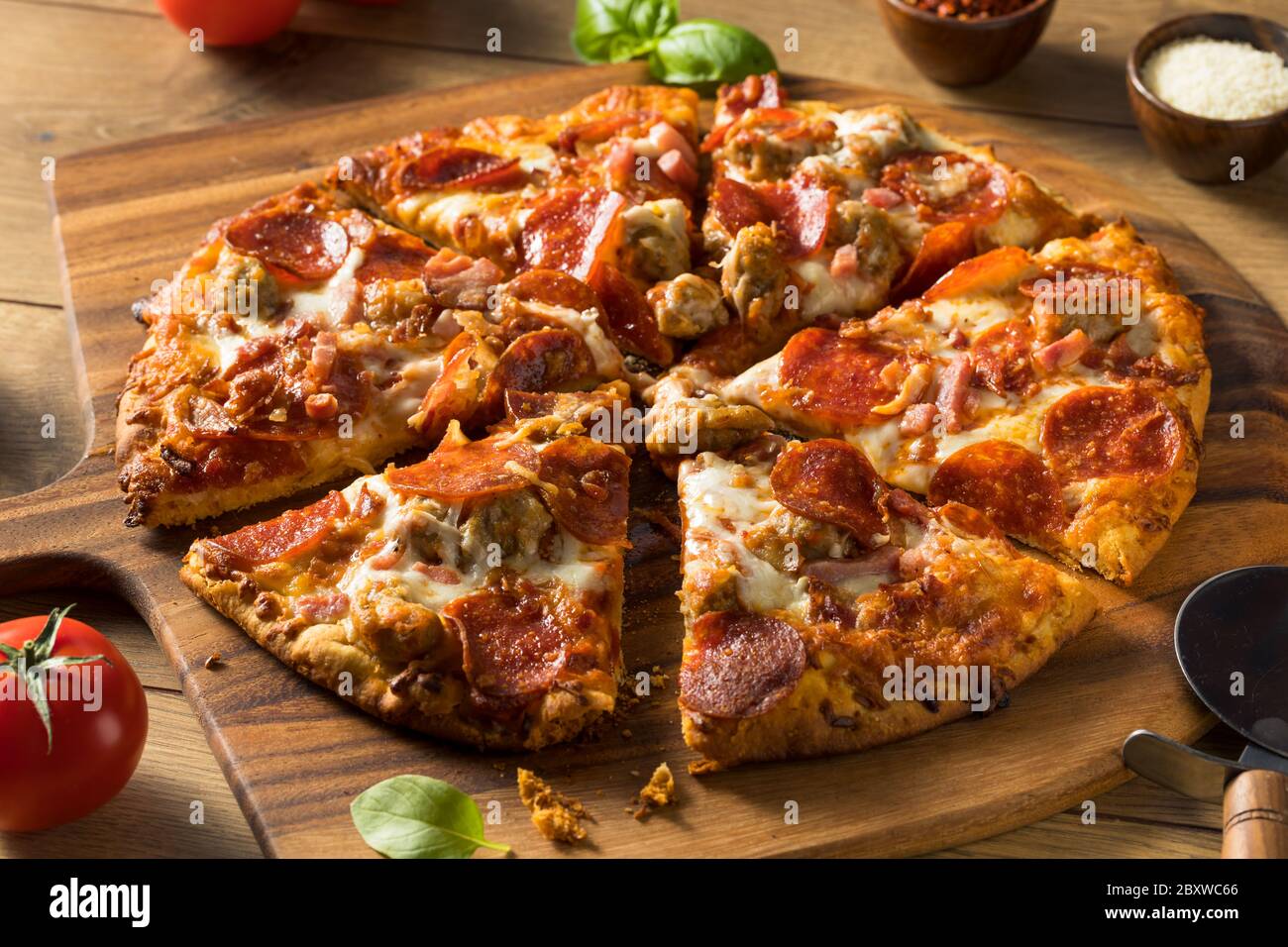 Savory Homemade Meat Lovers Pizza with Pepperoni and Bacon Stock Photo ...