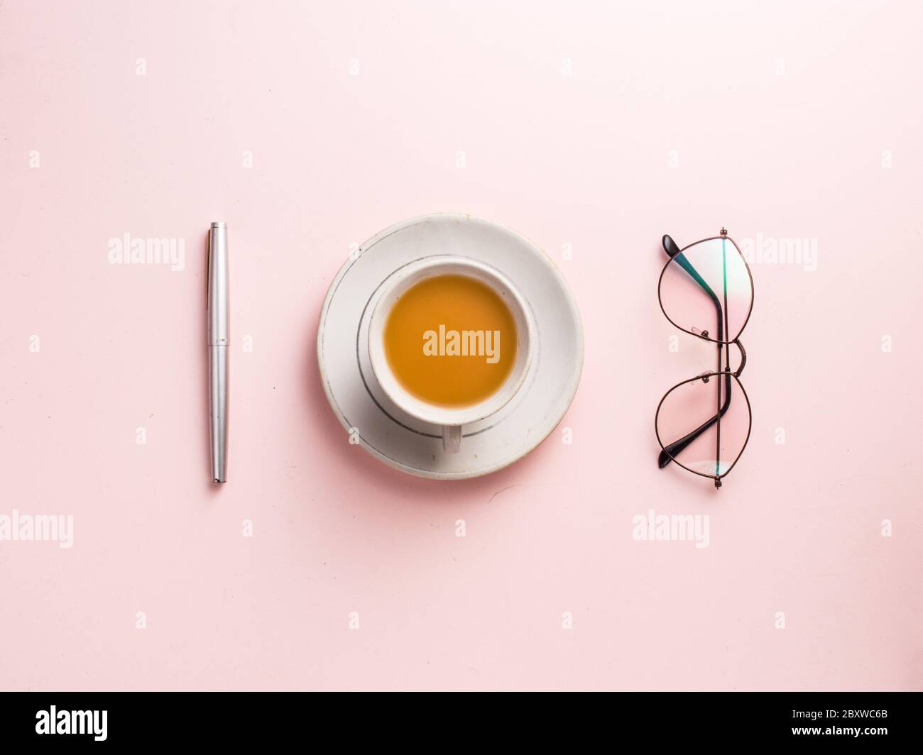 Milk tea and light pink colour background stock image Stock Photo - Alamy