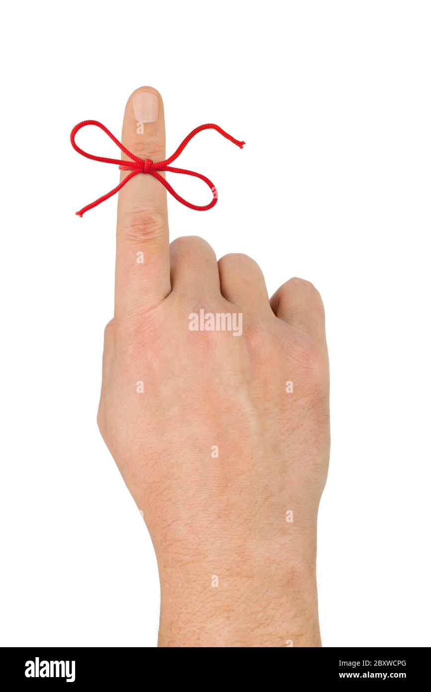 Red bow on finger Stock Photo - Alamy