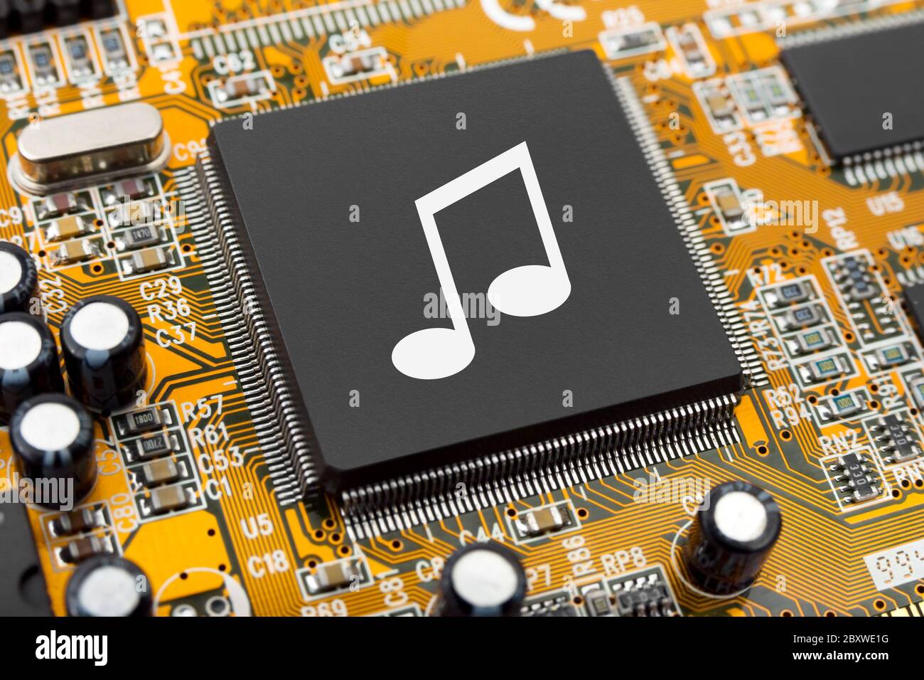 Music note on computer chip Stock Photo - Alamy
