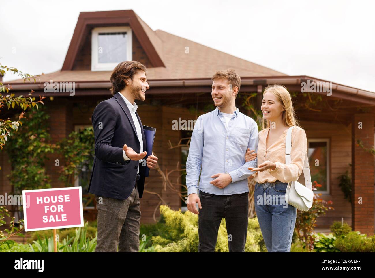 People outside talking selling house hi-res stock photography and ...