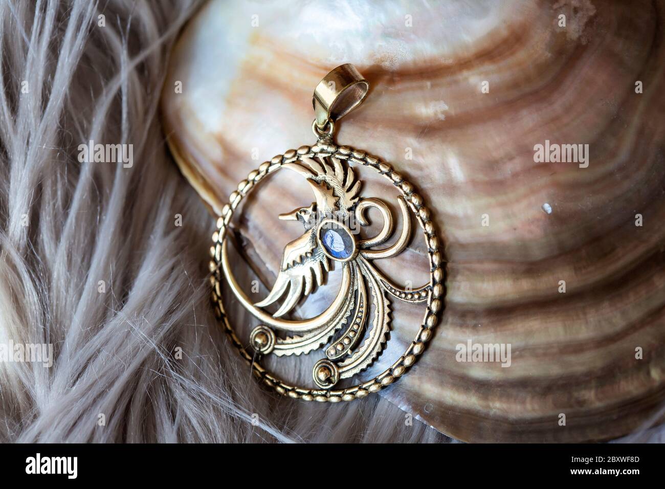 Brass pendant with Phoenix in round shape mandala on white shell ...