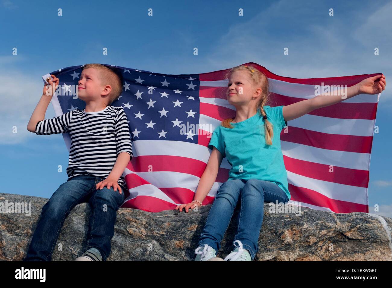 Children waving american flag hi-res stock photography and images - Alamy