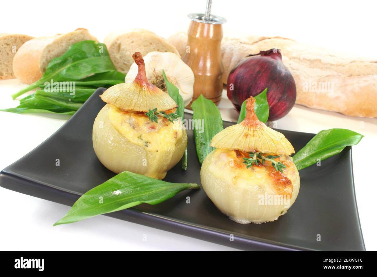 stuffed onions with goat cheese Stock Photo - Alamy