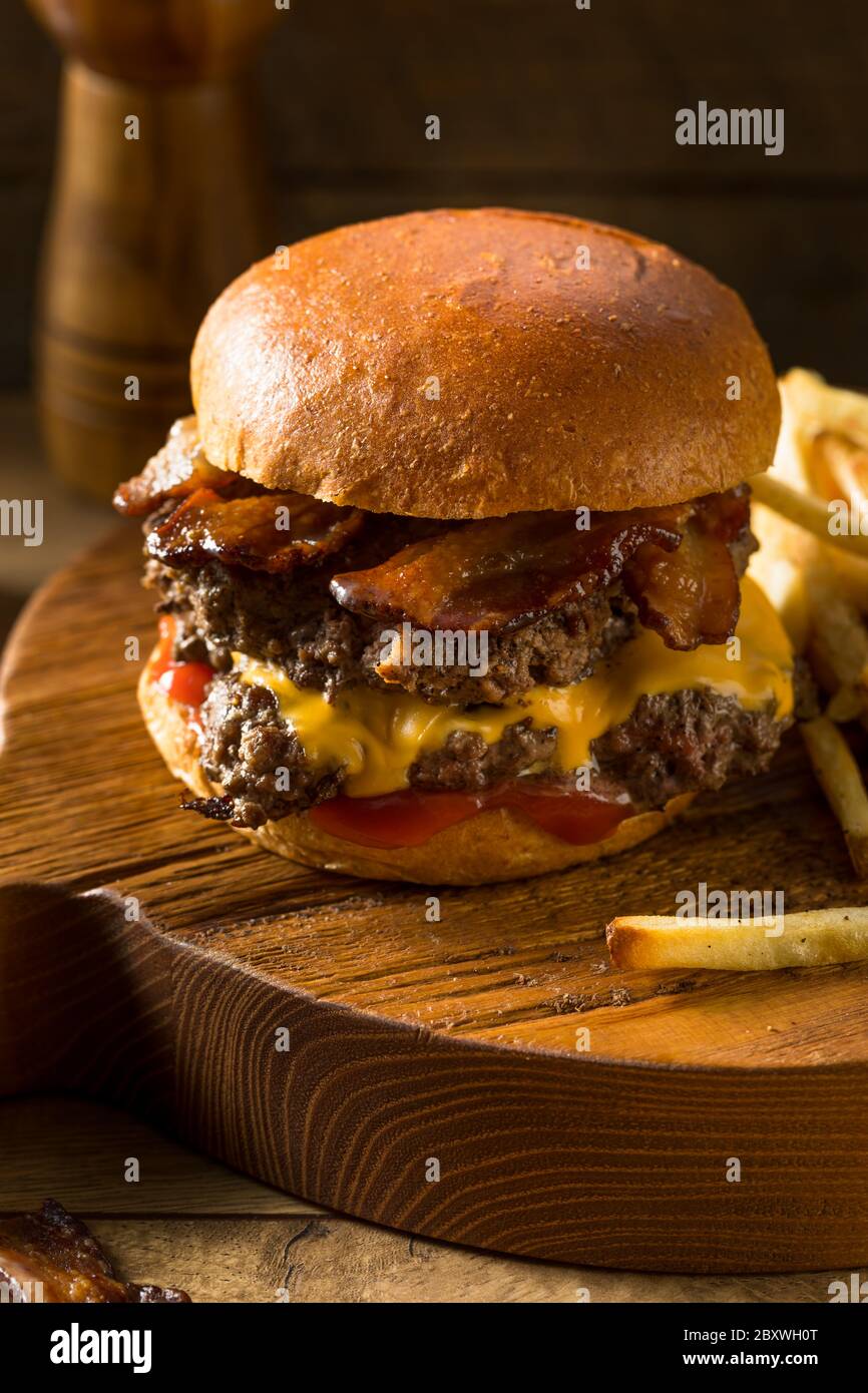 Rustic Homemade Bacon Smashburger with Cheese and Bacon Stock Photo - Alamy