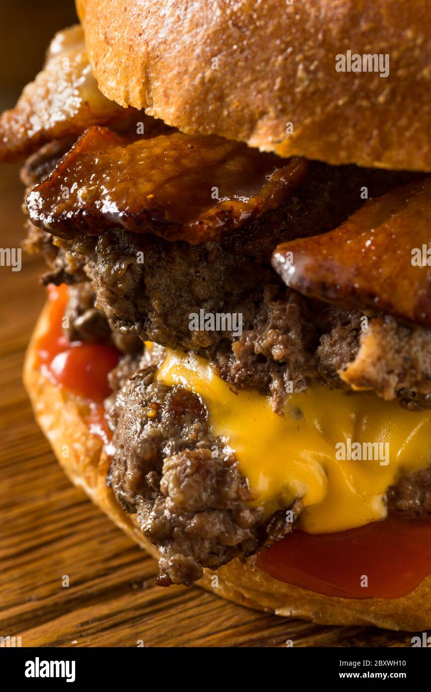 Rustic Homemade Bacon Smashburger with Cheese and Bacon Stock Photo - Alamy