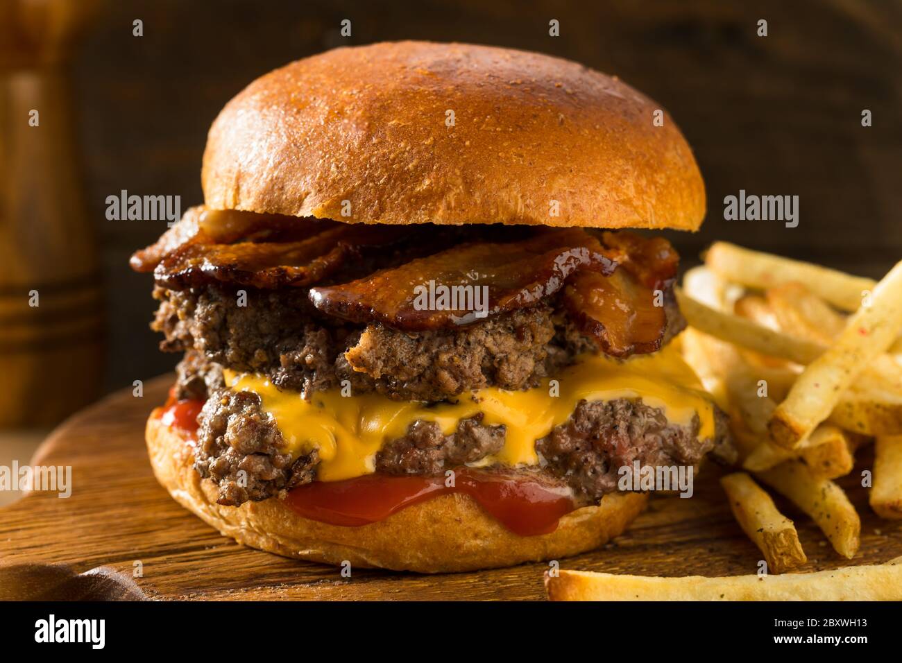 Rustic Homemade Bacon Smashburger with Cheese and Bacon Stock Photo - Alamy