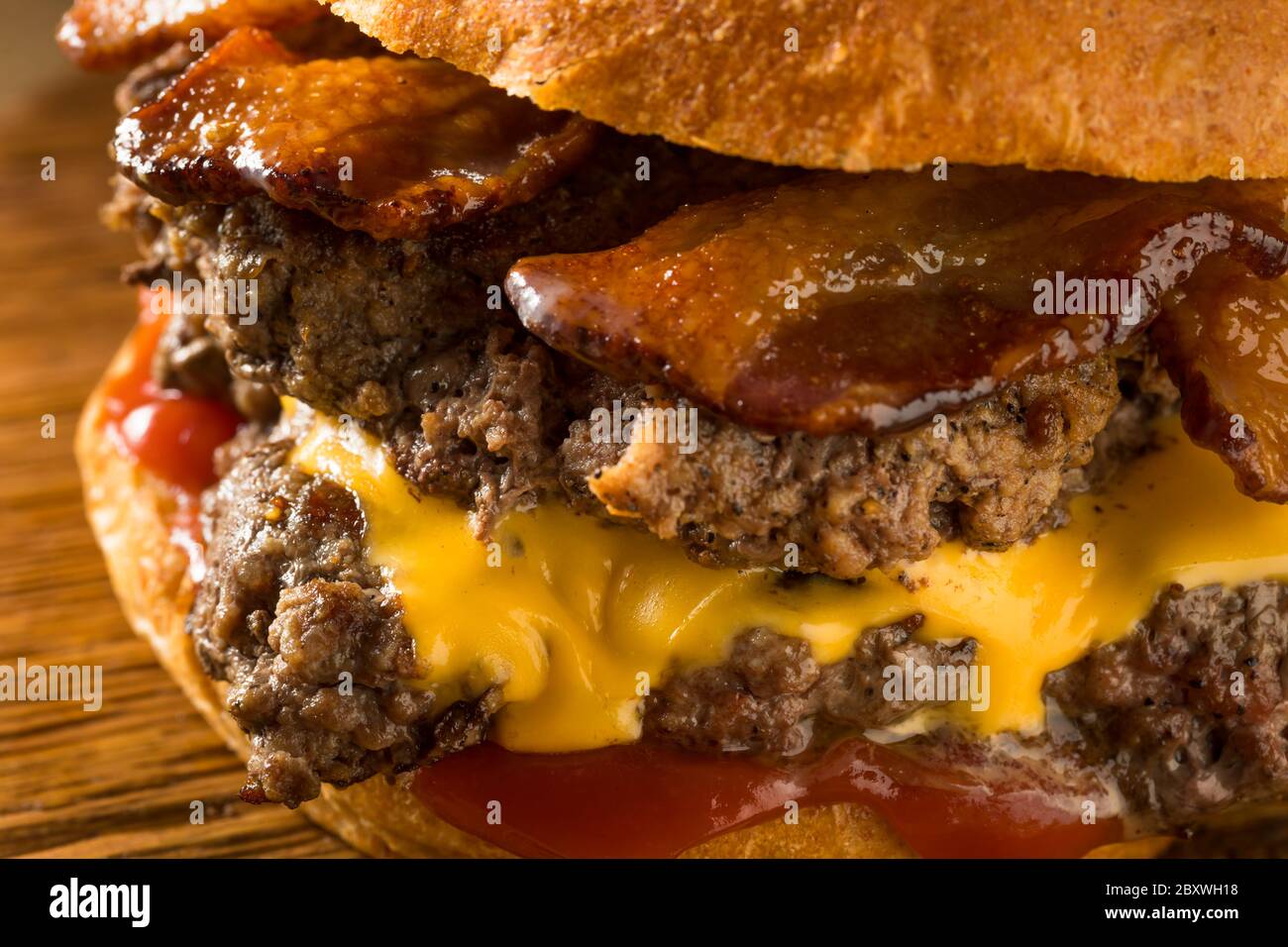 Rustic Homemade Bacon Smashburger with Cheese and Bacon Stock Photo - Alamy