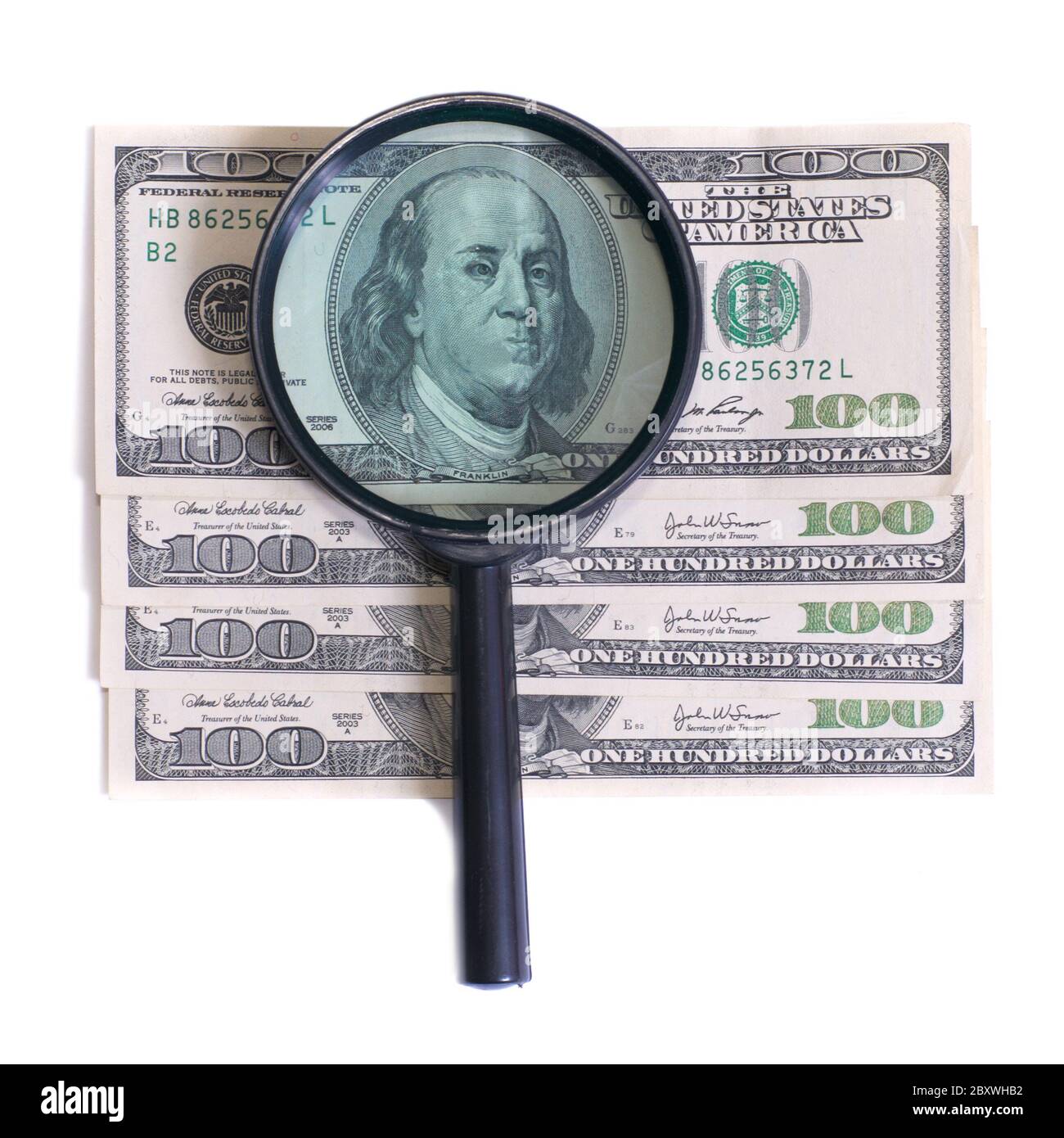 Magnifier and dollar bill Cut Out Stock Images & Pictures - Alamy
