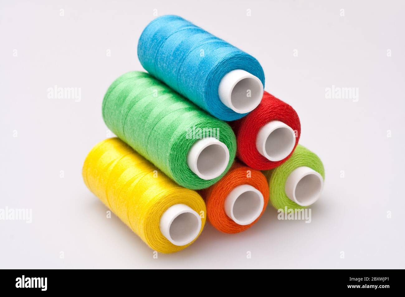 colored thread for sewing Stock Photo - Alamy