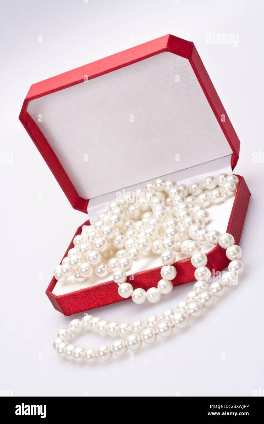 pearls in a red box Stock Photo - Alamy