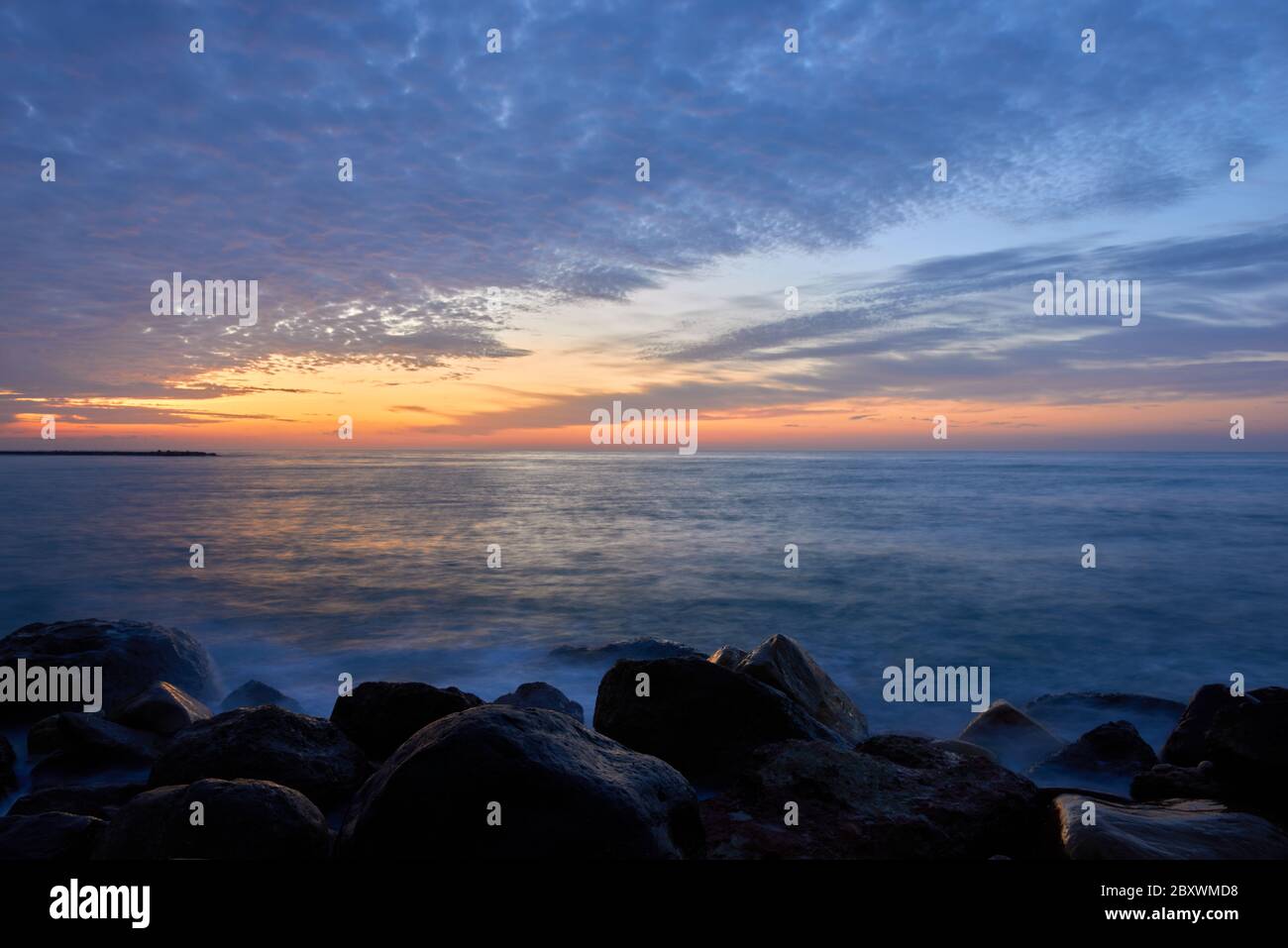 A beautiful sunrise on the beach in Chilches, Castellón, Spain Stock ...