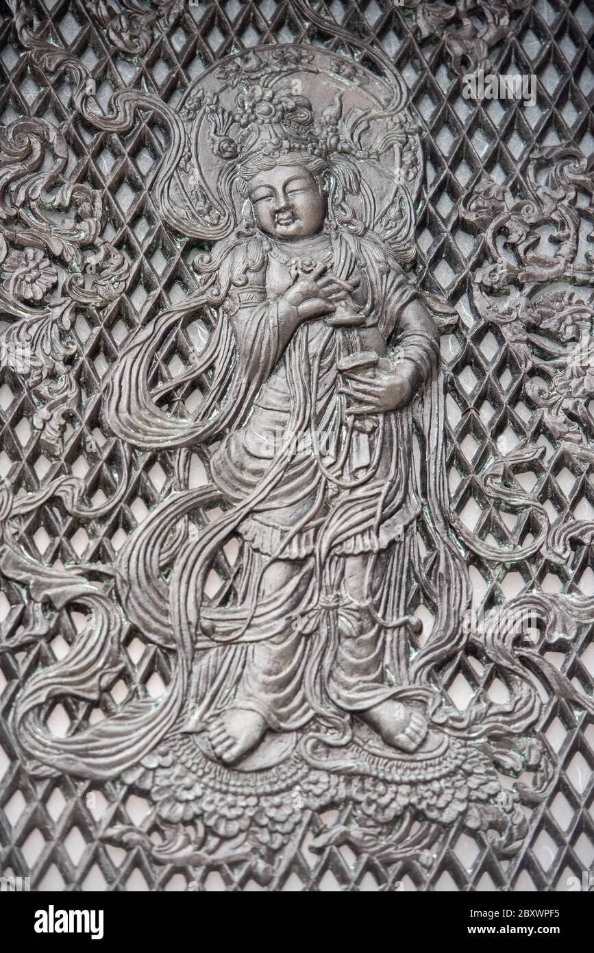 A detail of buddah. A relief on one of the Octagonal Lantern plates in ...