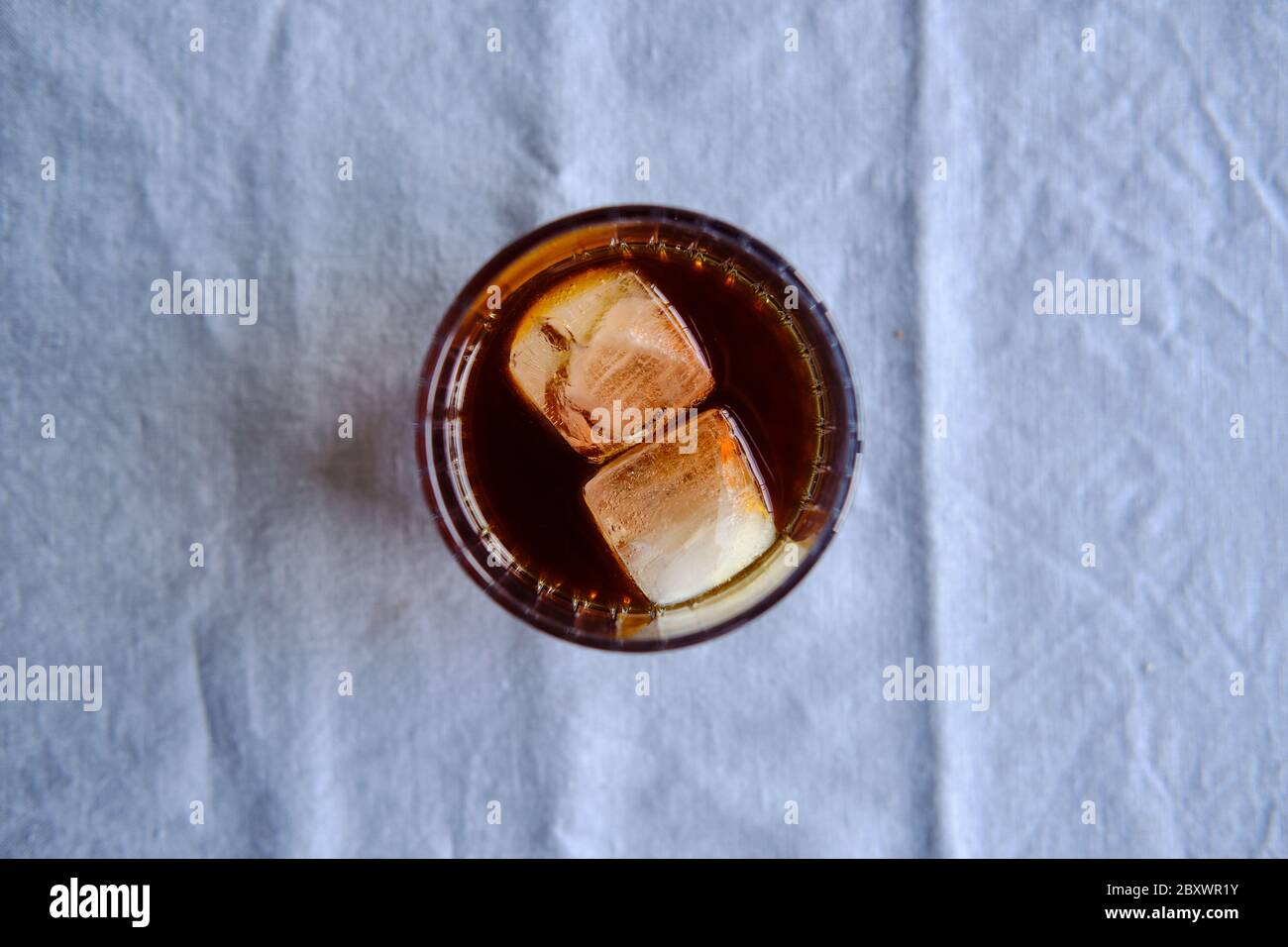 Cold brew coffee with two ice cubes Stock Photo - Alamy