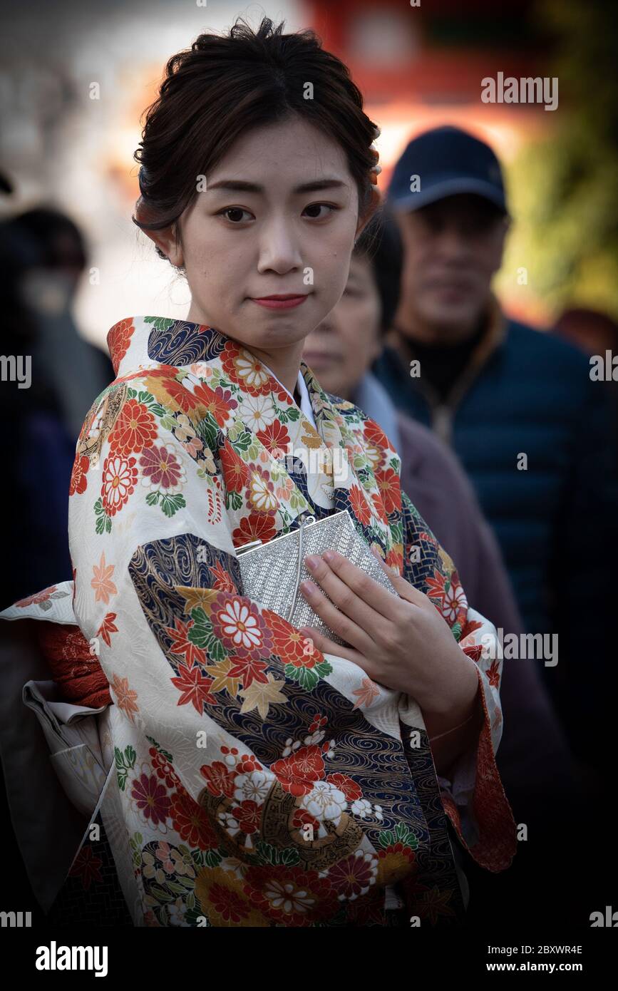A young Japanese woman wearing traditional clothing in Kyoto, Japan ...