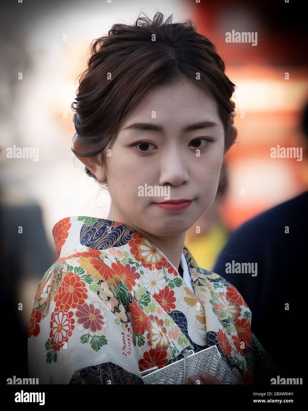 A young Japanese woman wearing traditional clothing in Kyoto, Japan ...
