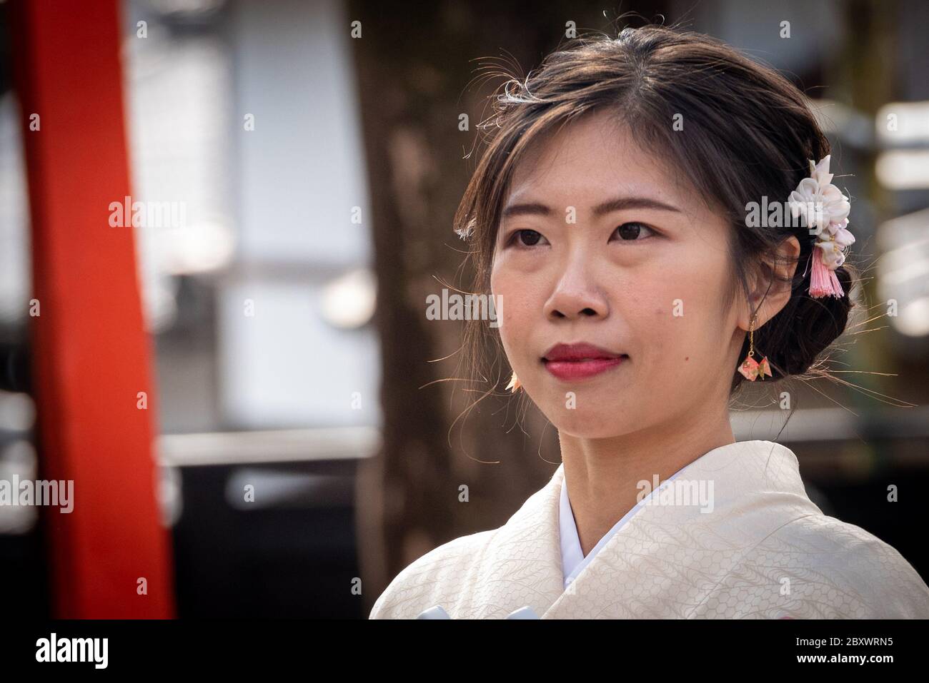 A young Japanese woman wearing traditional clothing in Kyoto, Japan ...