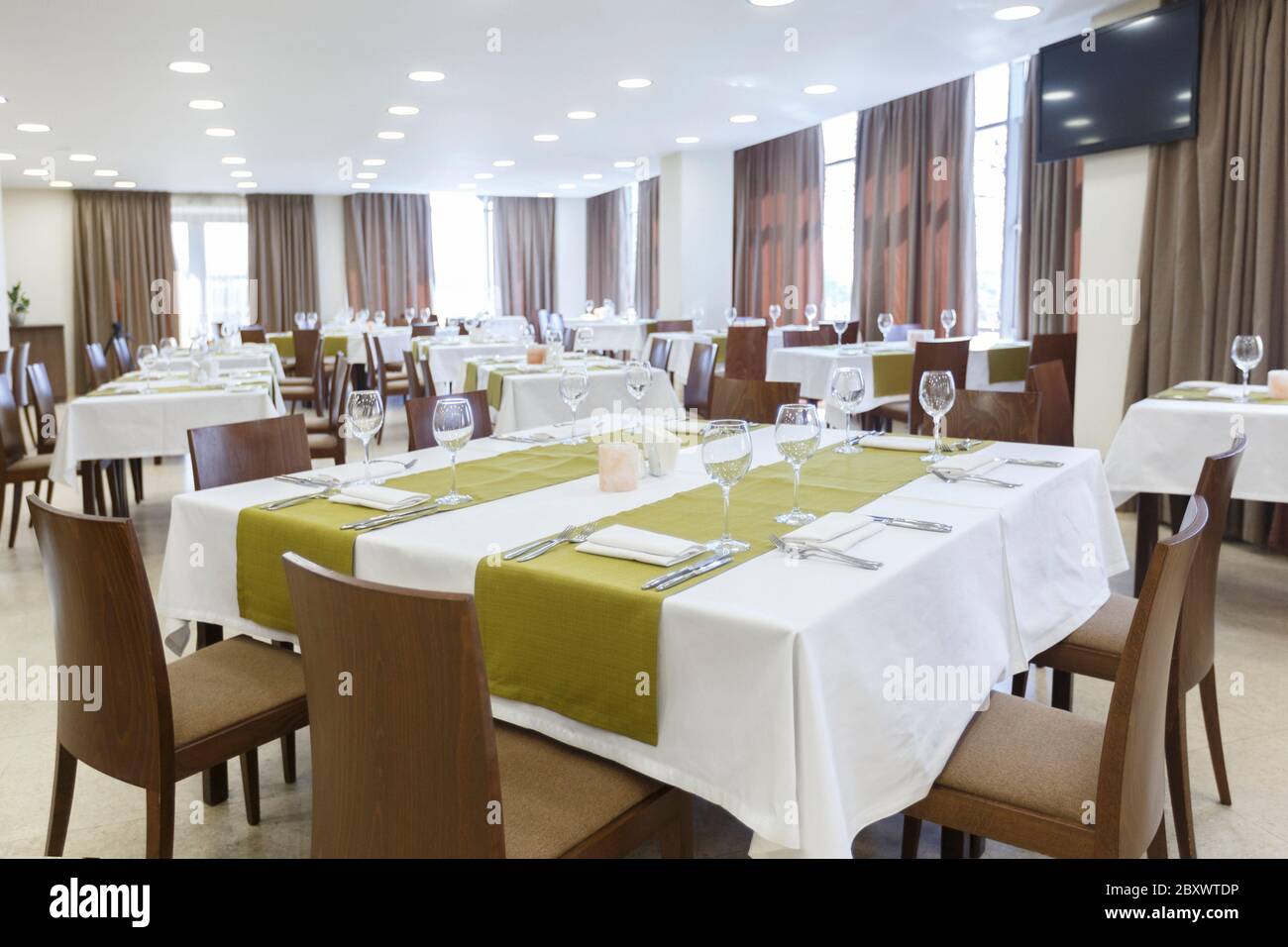 Large decorated table in luxury hotel restaurant Stock Photo - Alamy