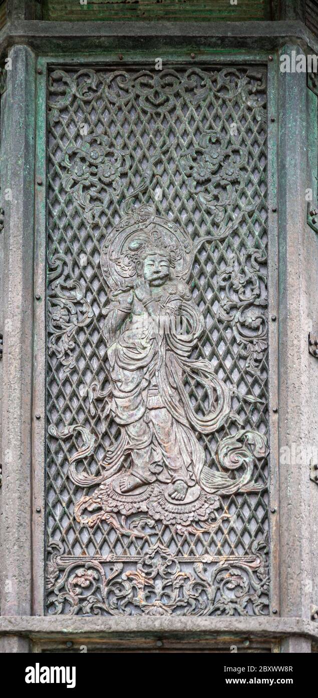 A detail of buddah. A relief on one of the Octagonal Lantern plates in ...