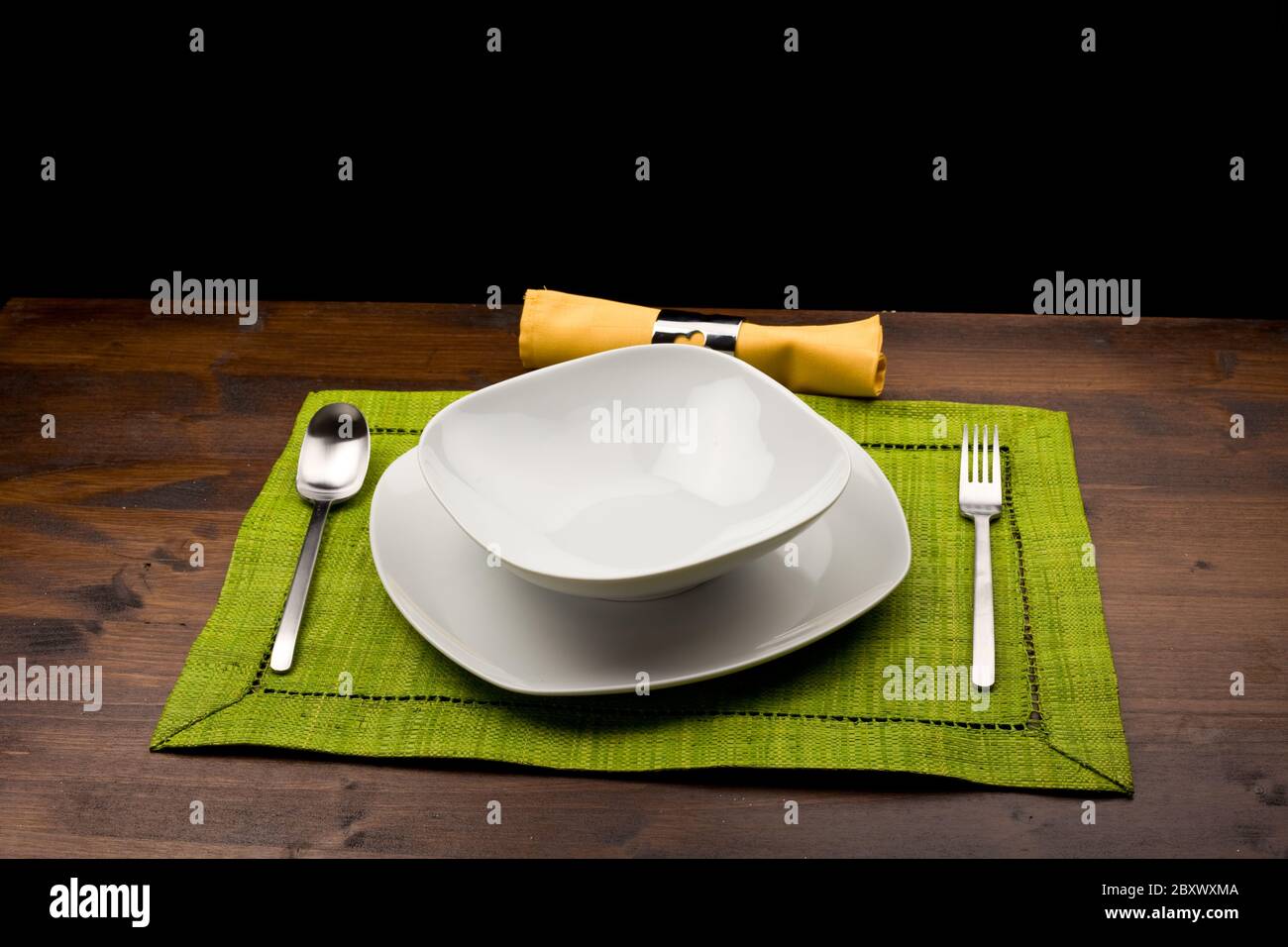 Table with dishes Stock Photo - Alamy