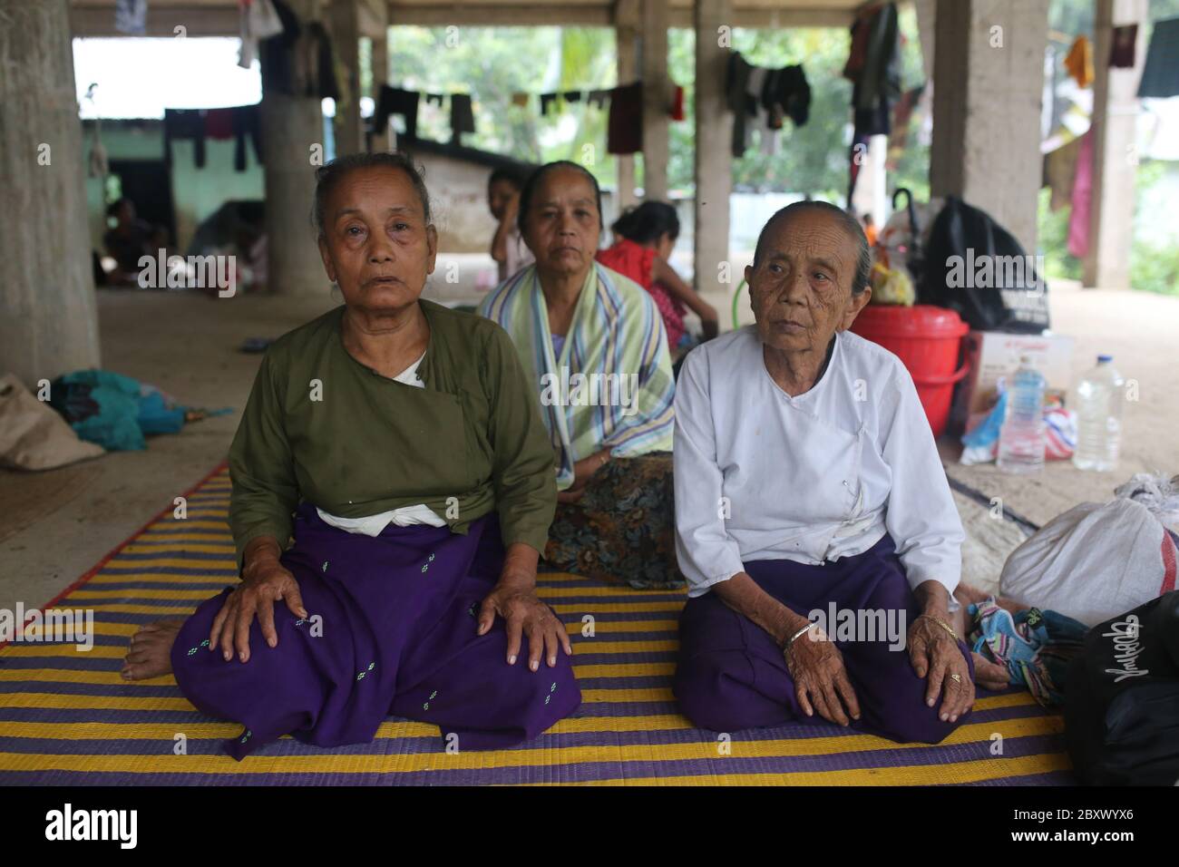 Flood affected indigenous people take shelter at a temporary shelter ...