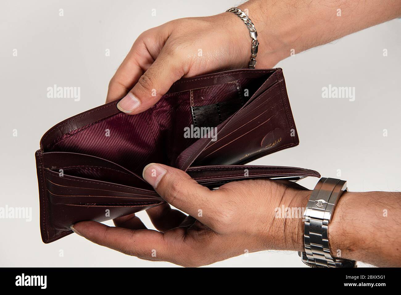 Man hand open an empty wallet isolated on white background Stock Photo ...