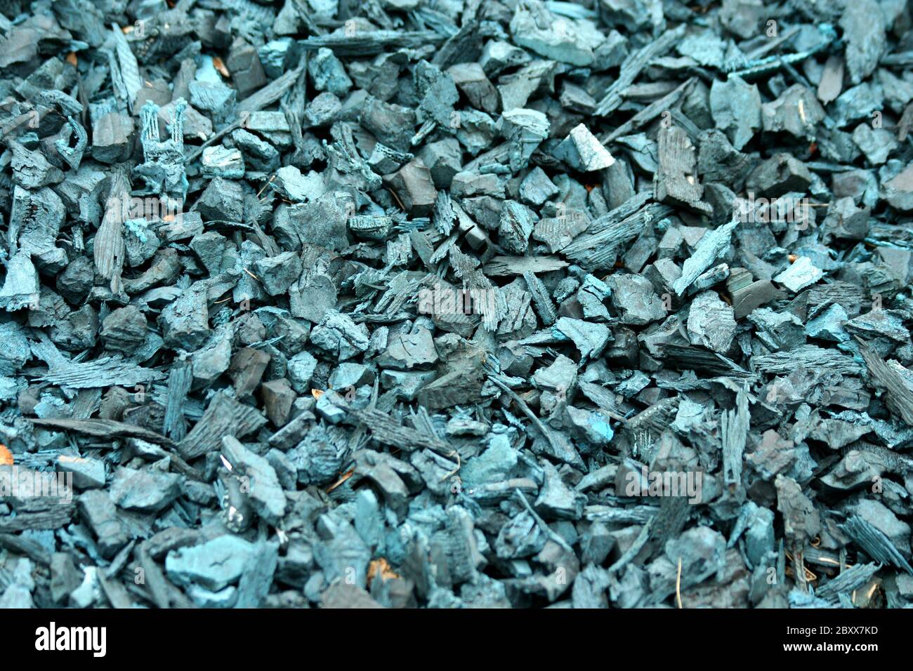 Blue Recycled shredded tire rubber background Stock Photo - Alamy