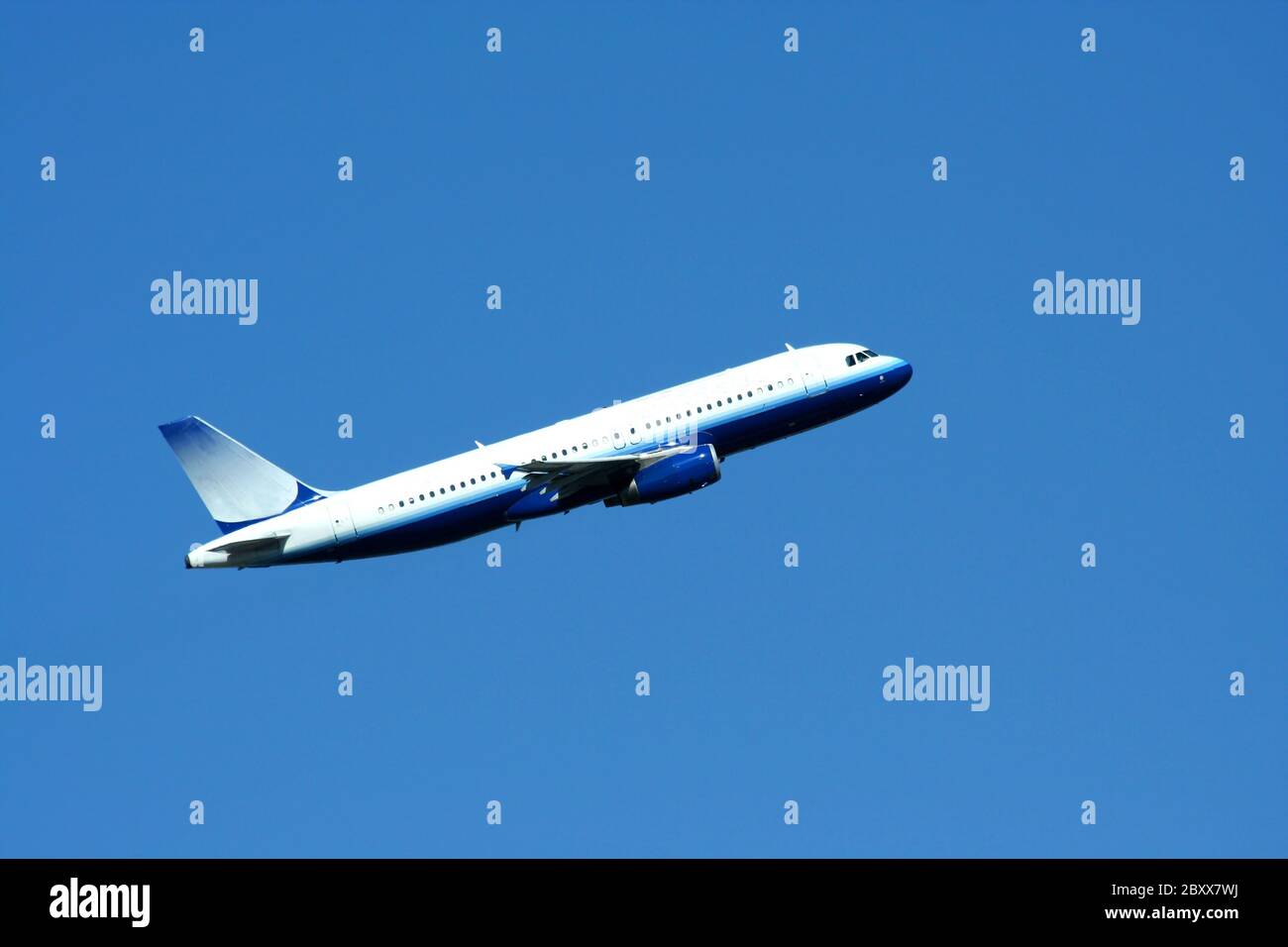 A Passenger jet plane taking off Stock Photo - Alamy