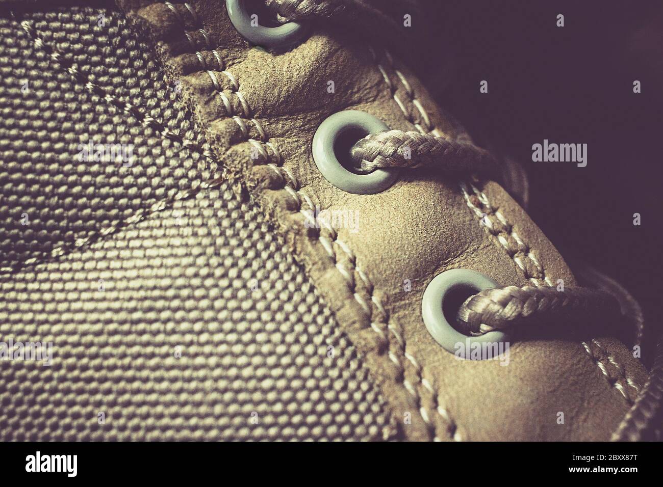 Close up lacing of a brown leather adventure boot Stock Photo - Alamy