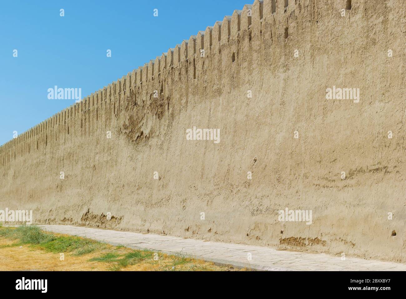 Ancient medieval big protective reinforcement wall with adobe clay ...