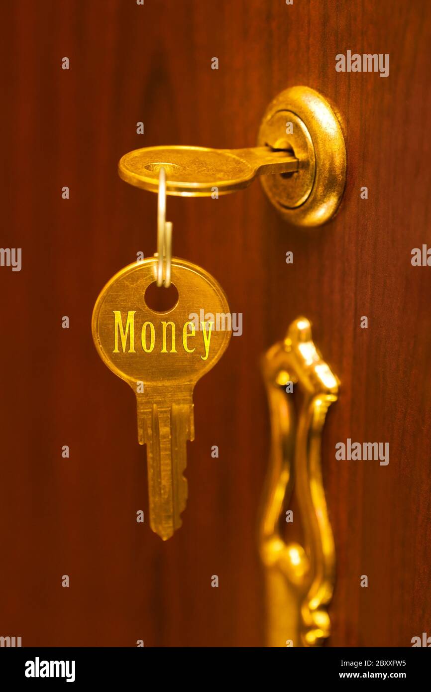 Golden key money keyhole hi-res stock photography and images - Alamy