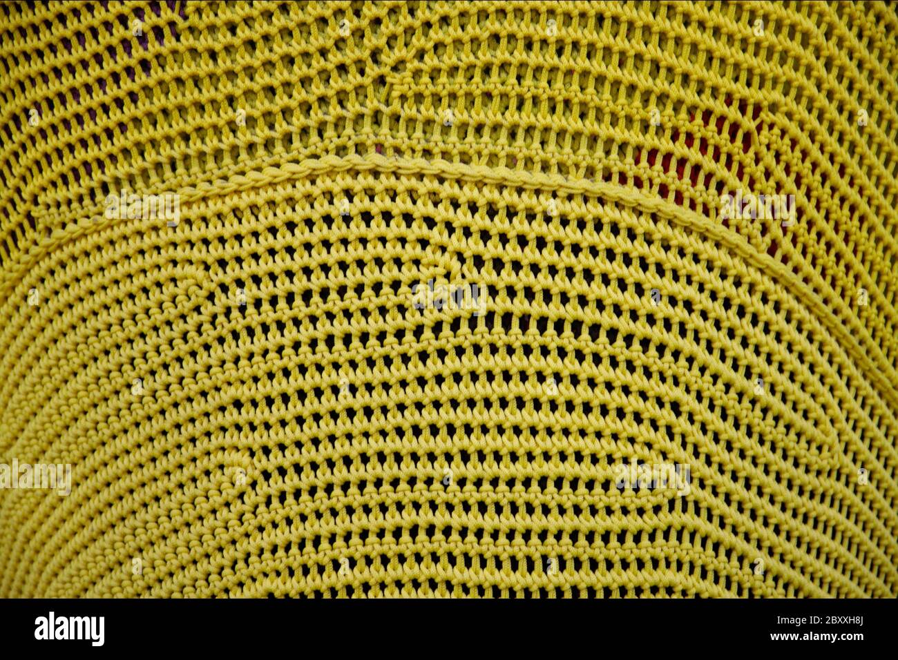 Crochet pattern, a close-up of a simple yellow knitting pattern for ...