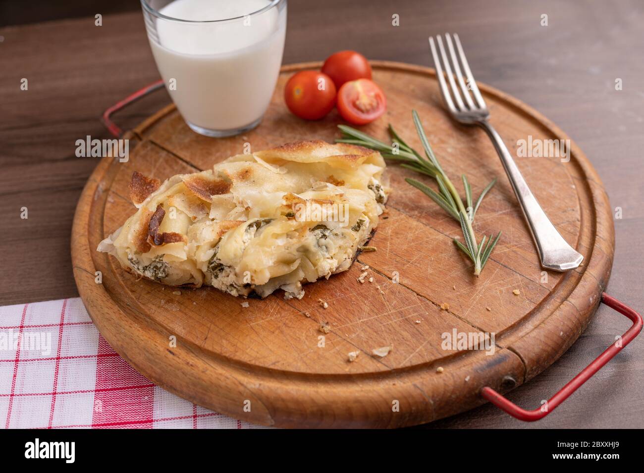 Traditional balkan breakfast - Burek pie with cheese and spinach served ...