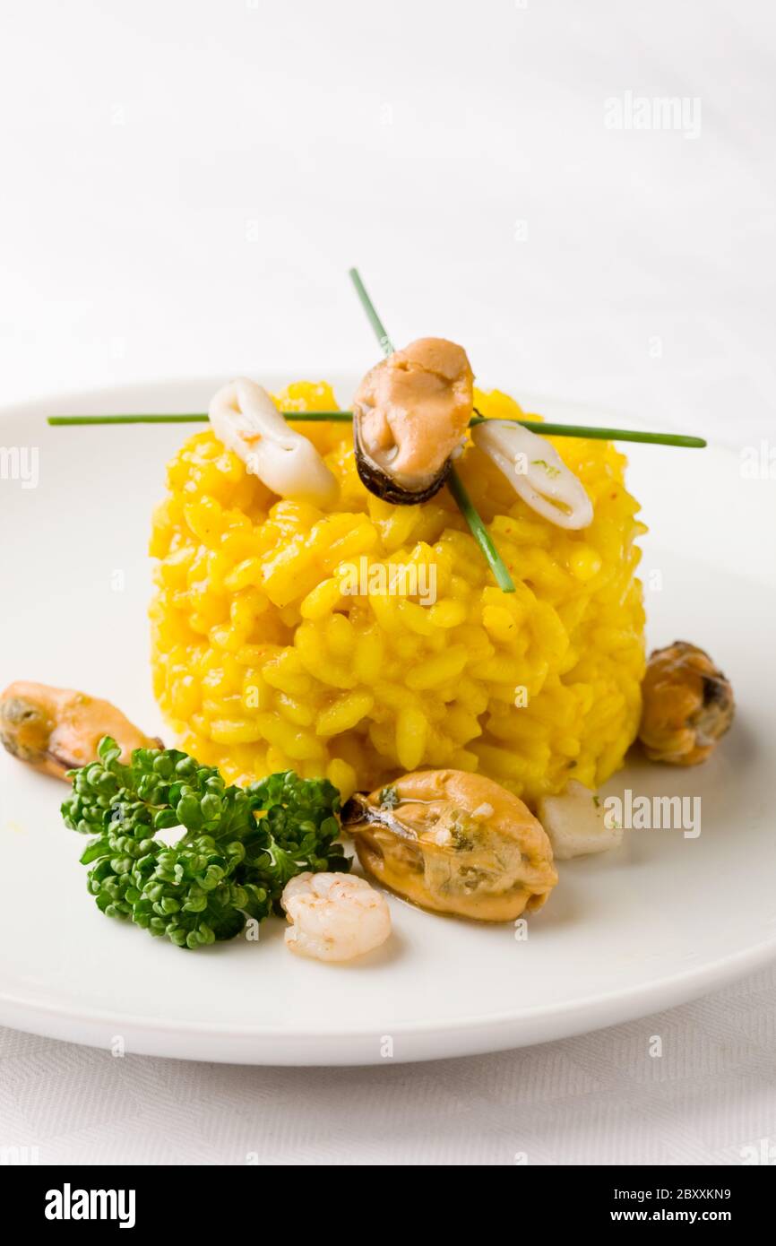 Risotto with saffron and seafood Stock Photo - Alamy