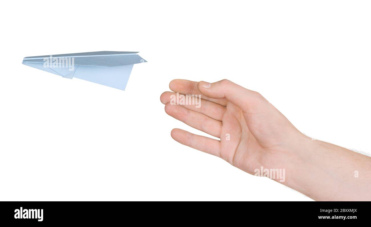 Hand and flying paper plane Stock Photo - Alamy
