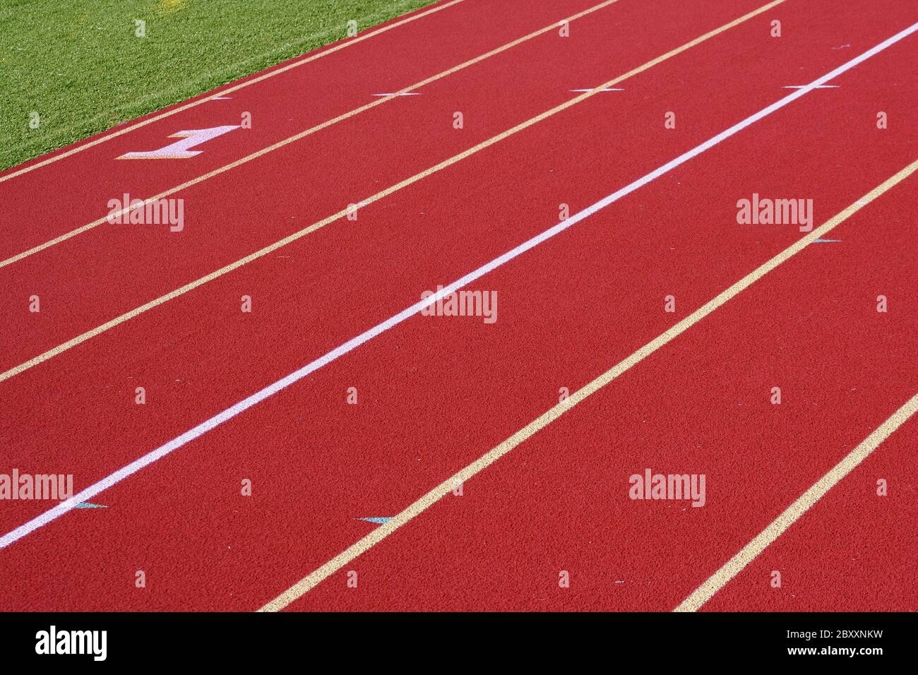 Some red Lanes from a Running track Stock Photo - Alamy
