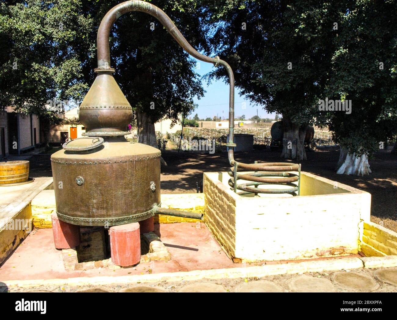 Copper pots in peruvian bodega Stock Photo - Alamy